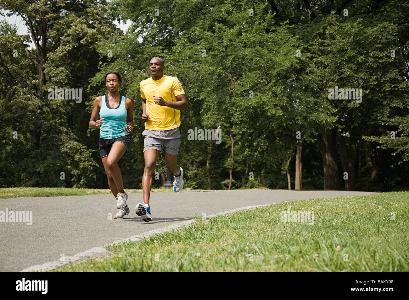 Runners in park Stock Photo - Alamy