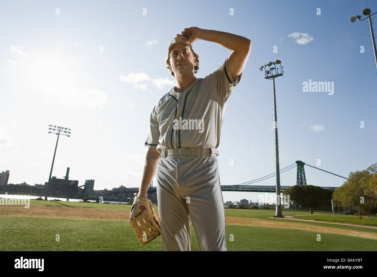 Baseball pitcher looking Stock Photo - Alamy