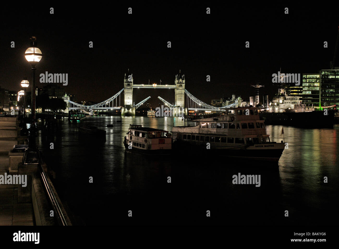 Tower Bridge raised at night Stock Photo - Alamy