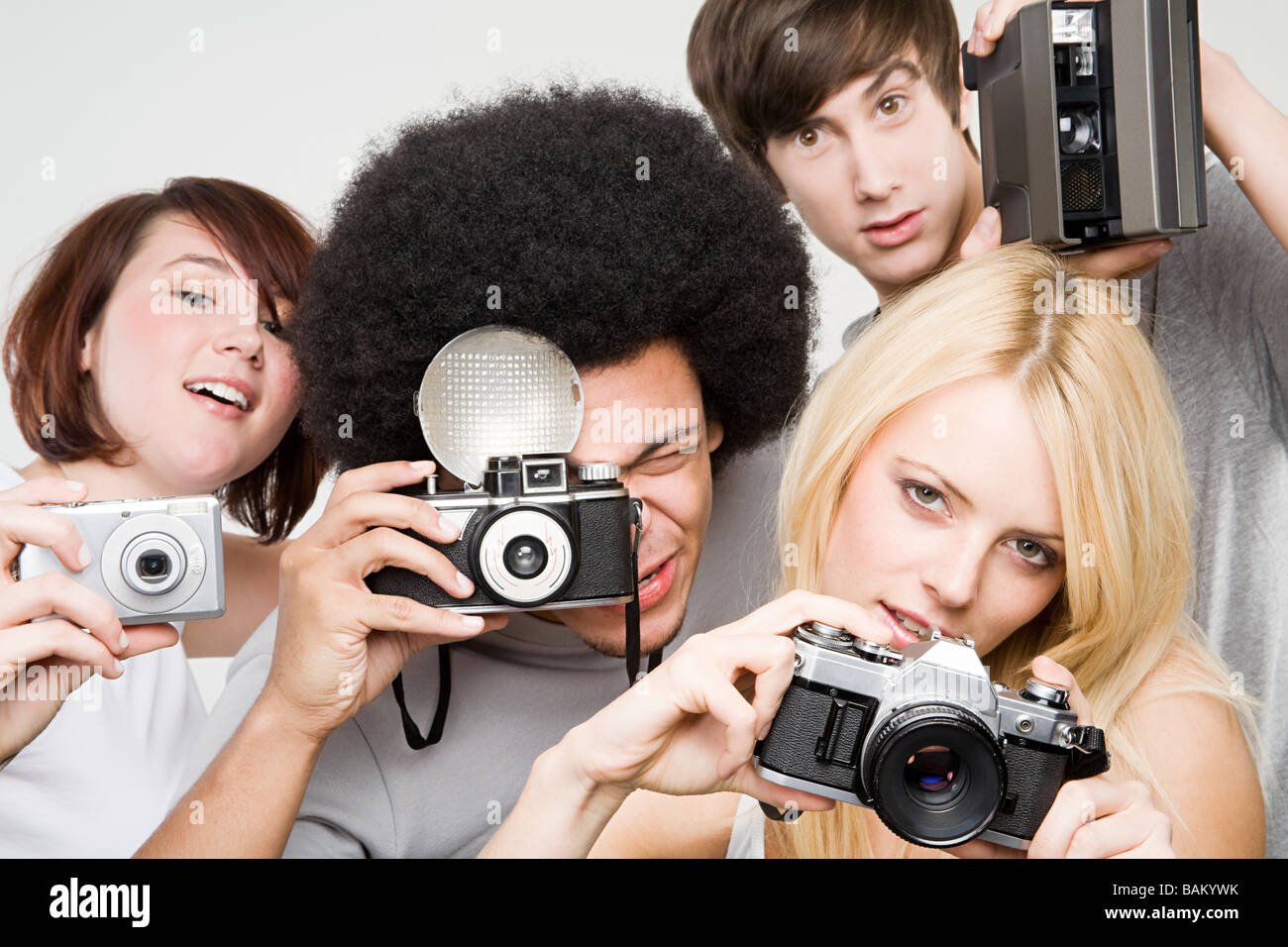 Friends taking pictures Stock Photo - Alamy