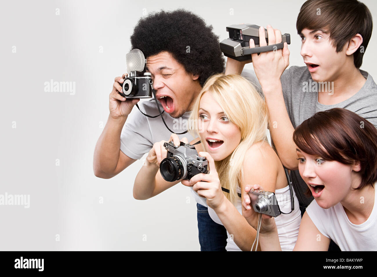 Friends taking pictures Stock Photo - Alamy