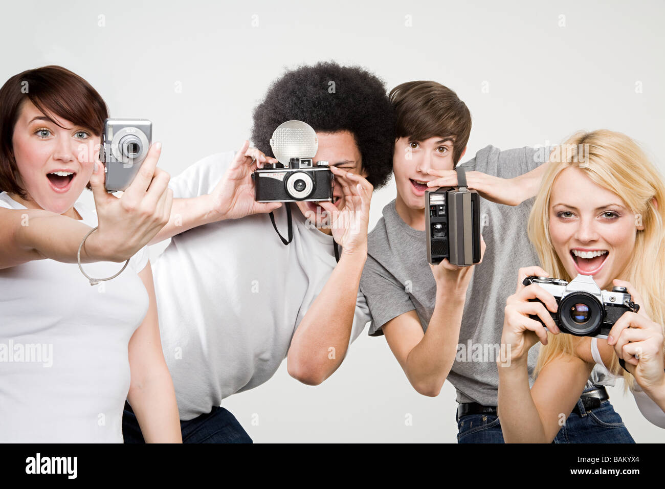 Friends taking pictures Stock Photo - Alamy