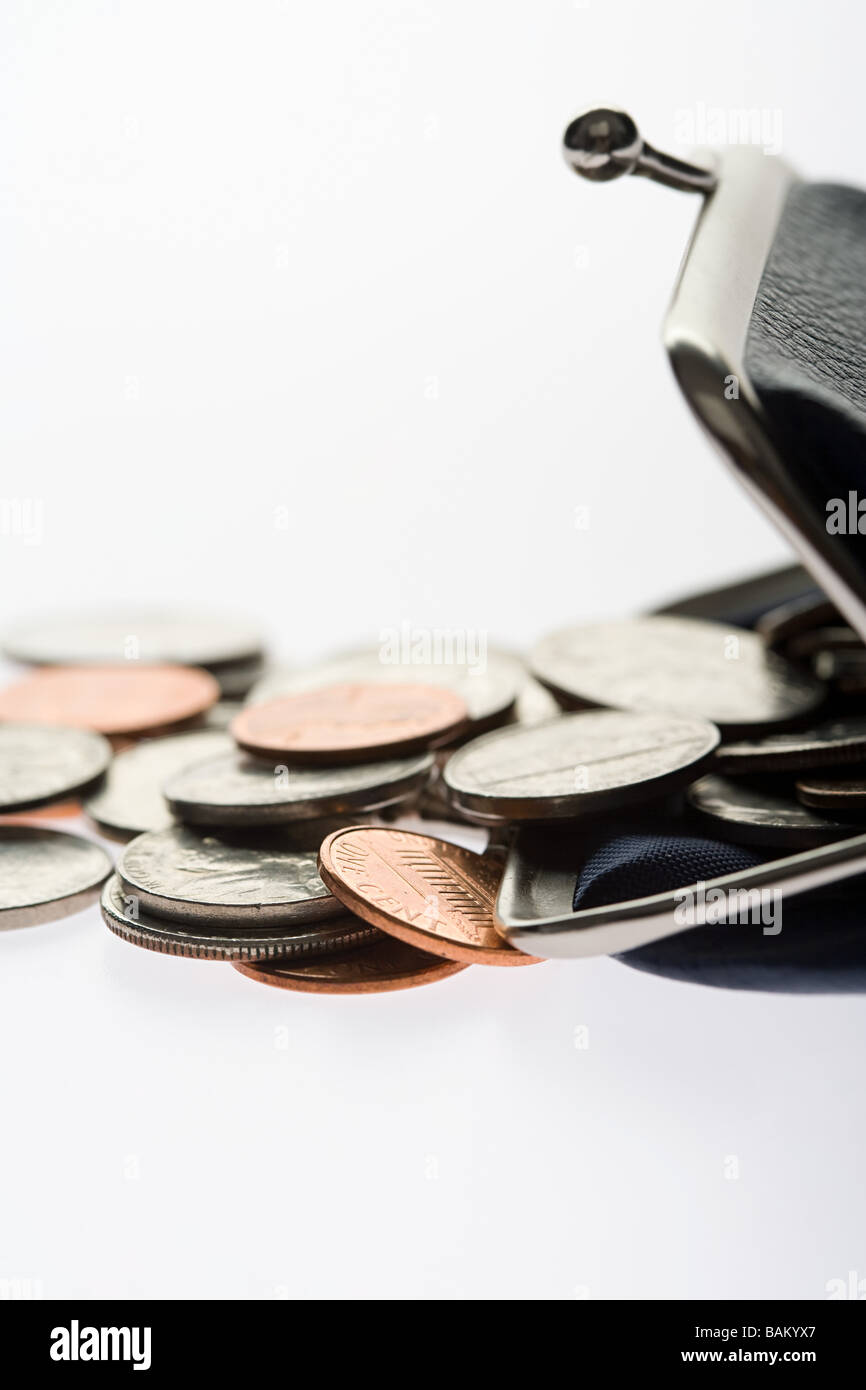 Open coin purse spilling hi-res stock photography and images - Alamy