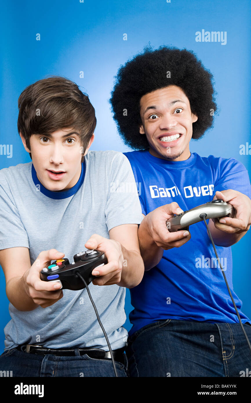 Friends playing a video game Stock Photo - Alamy