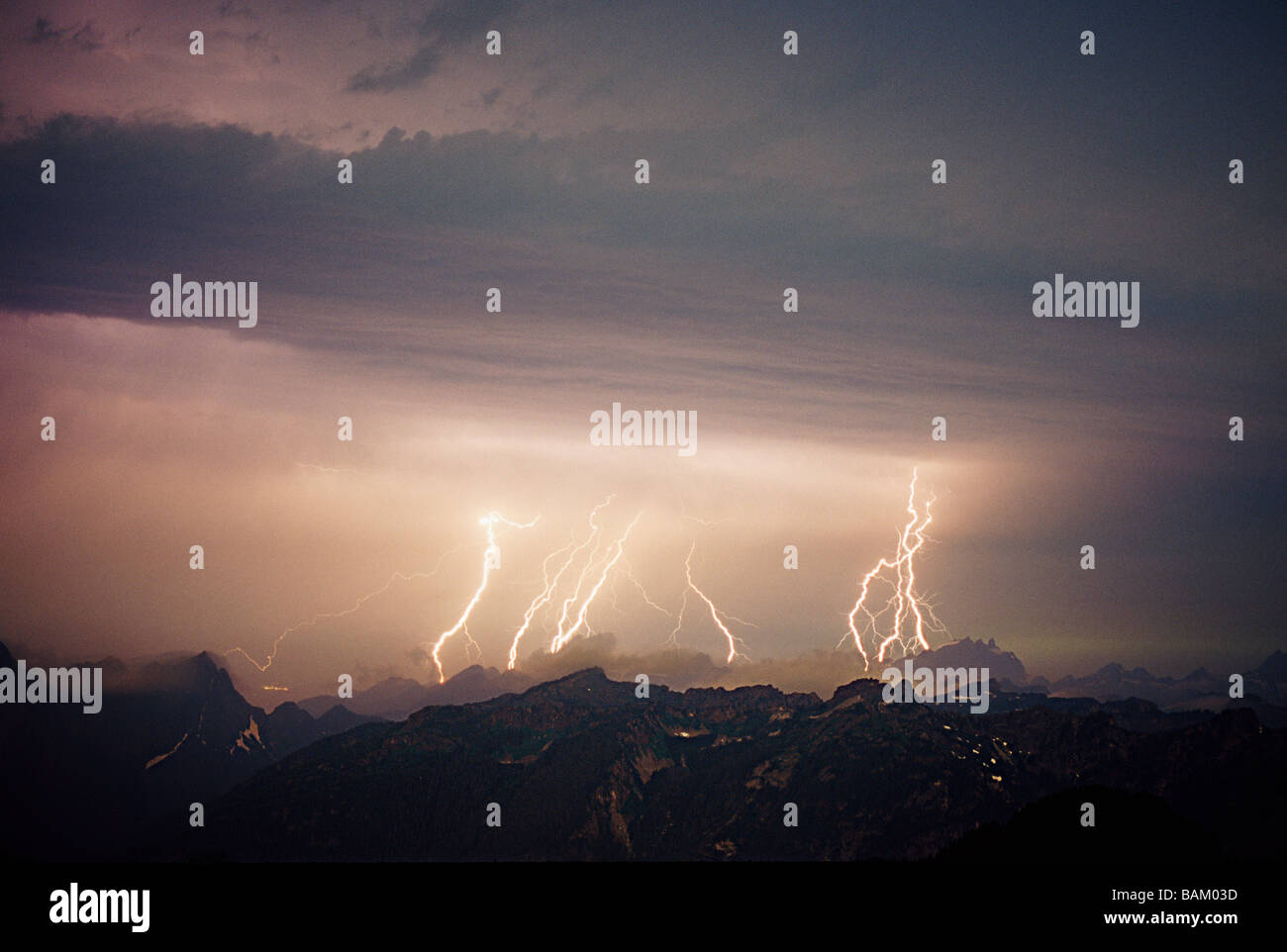 Lightning storm over cascade mountains Stock Photo - Alamy