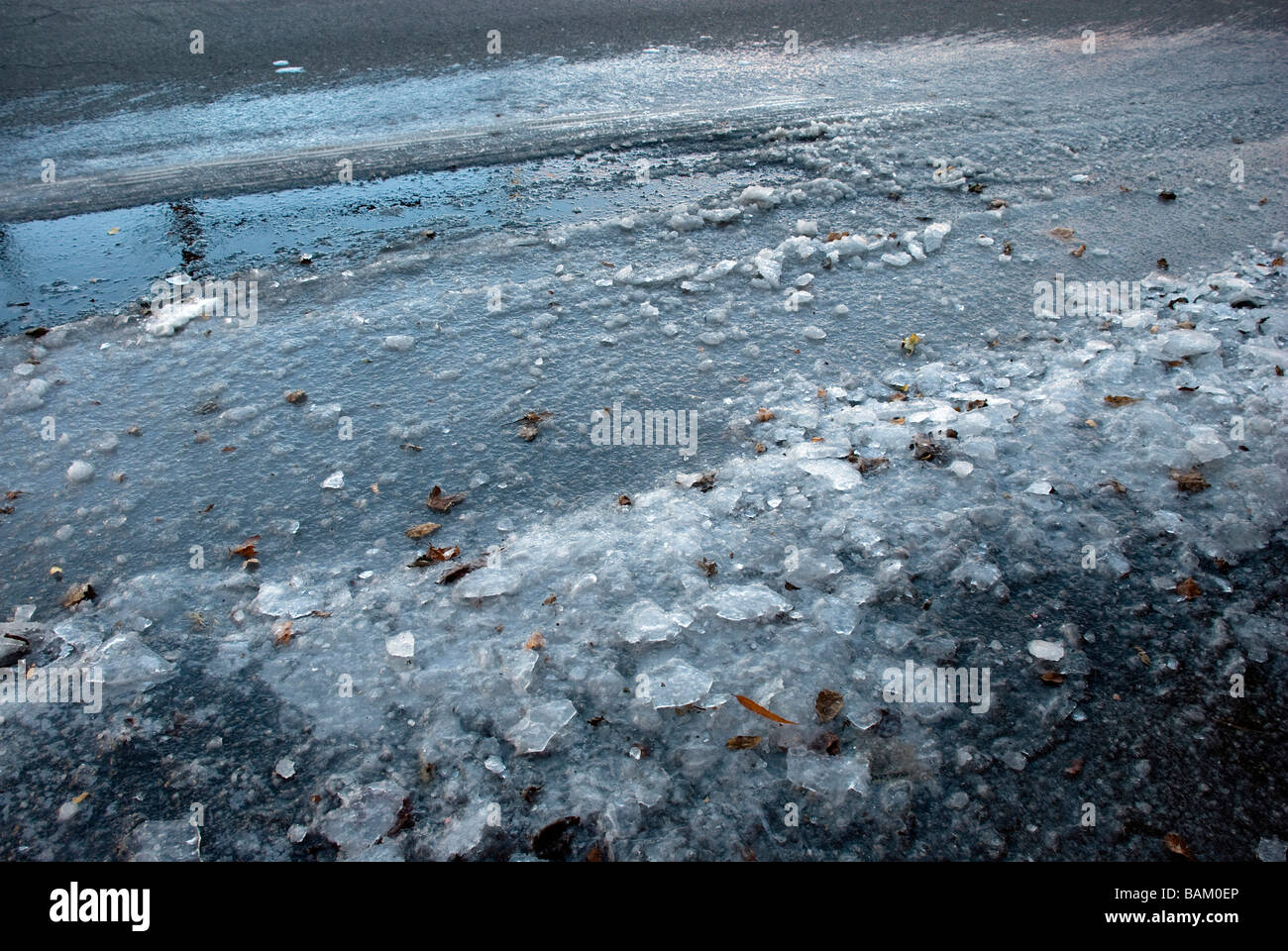 road curb ice sidewalk gutter broken frozen horizontal diagonal damage ...