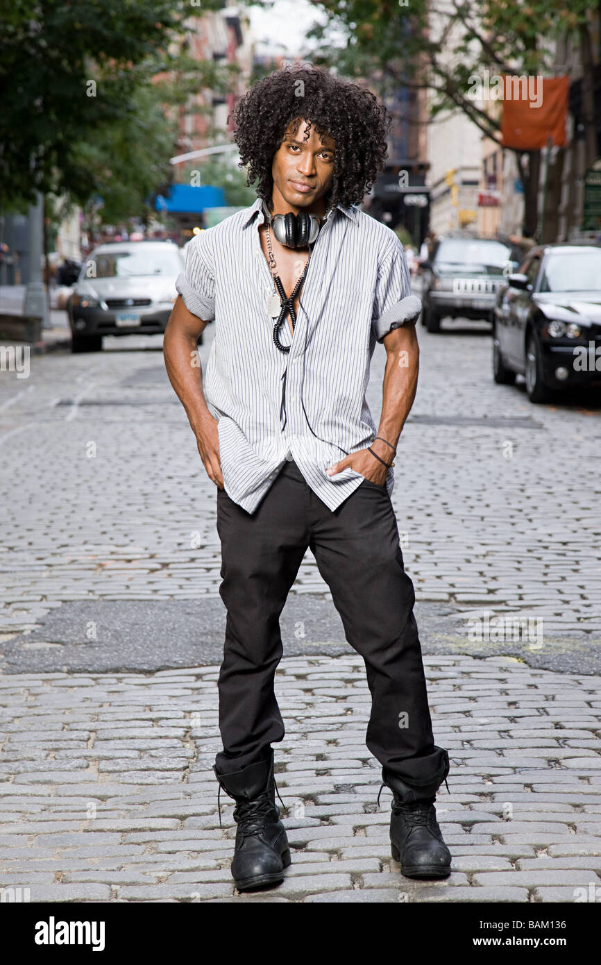 Young man in street Stock Photo - Alamy