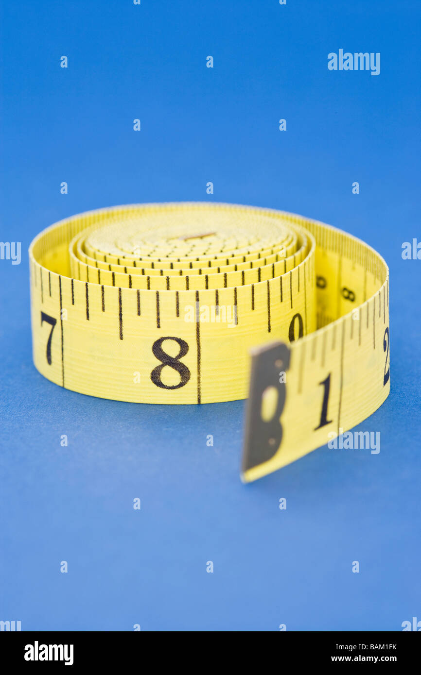 Coiled tape measure Stock Photo - Alamy