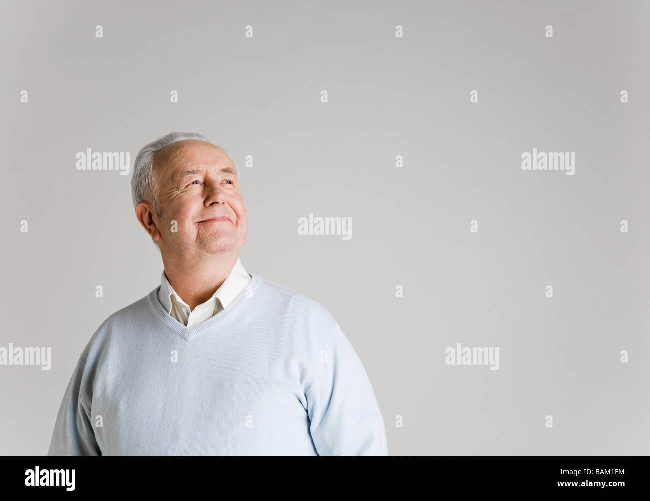 Good looking older man studio shot hi-res stock photography and images ...