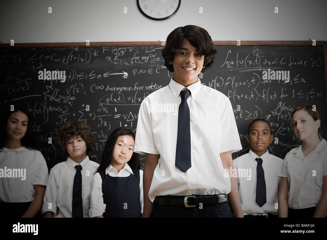 Students in front of blackboard Stock Photo - Alamy
