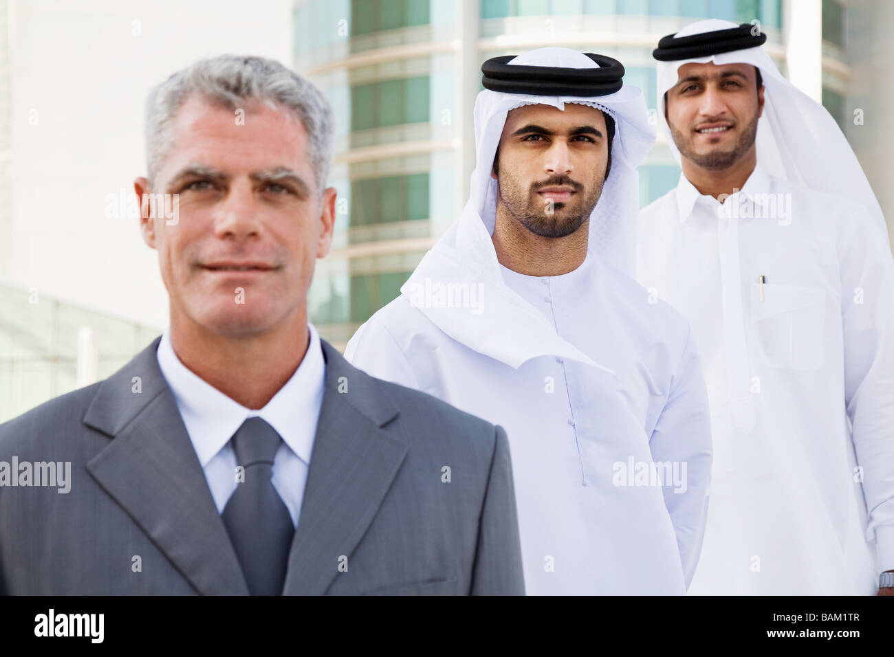 Middle eastern businessmen looking dubai hi-res stock photography and ...