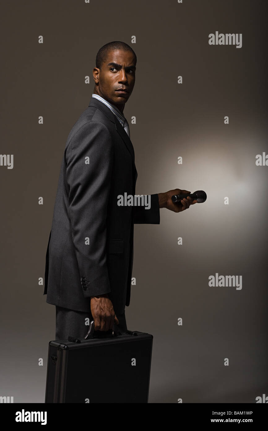 Businessman with torch Stock Photo - Alamy