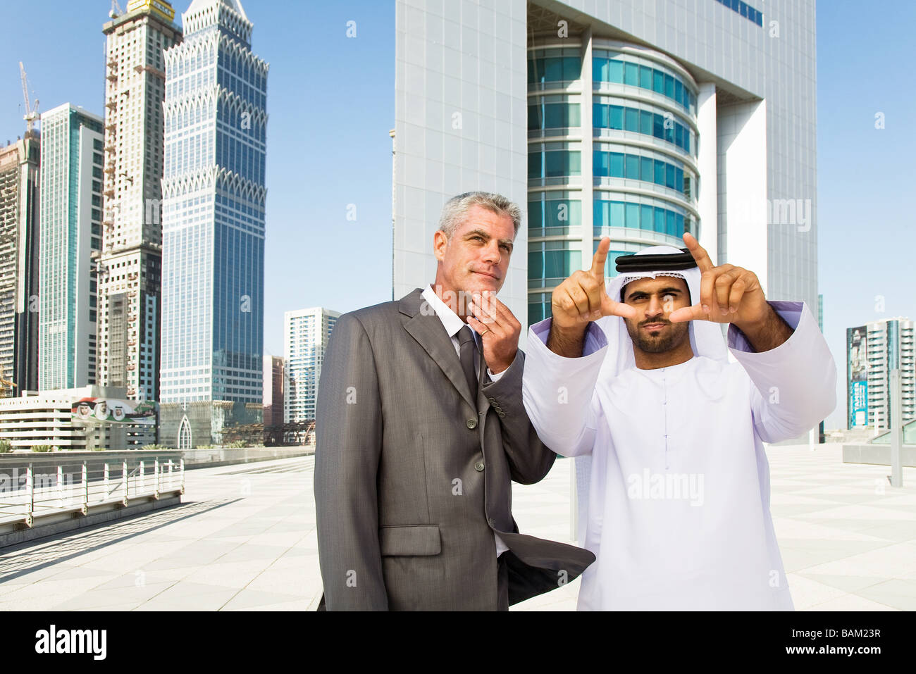 Businessmen in dubai Stock Photo - Alamy