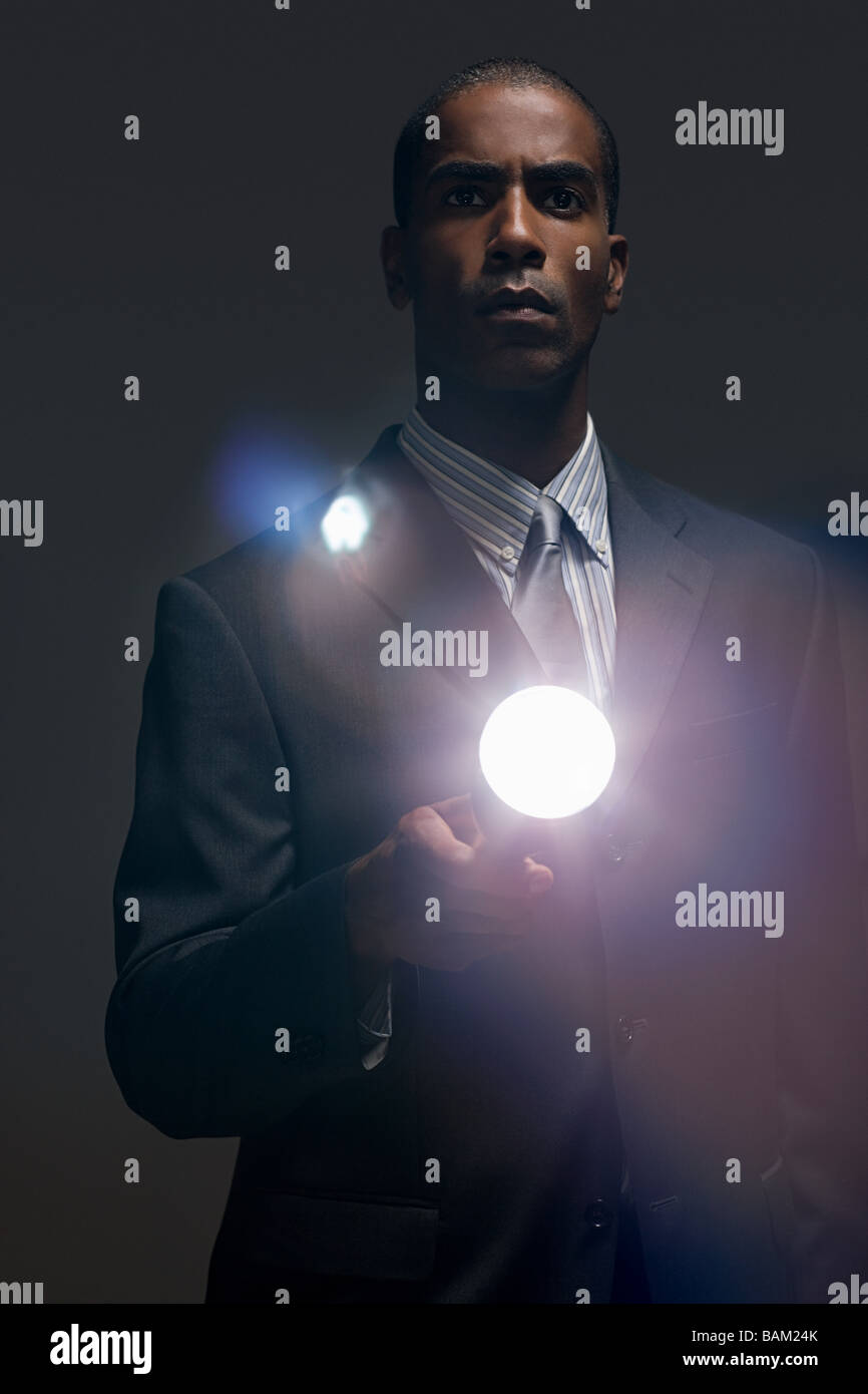 Man searching torch light hi-res stock photography and images - Alamy
