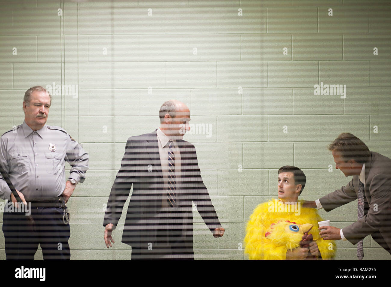 Man in chicken suit in police interview Stock Photo - Alamy