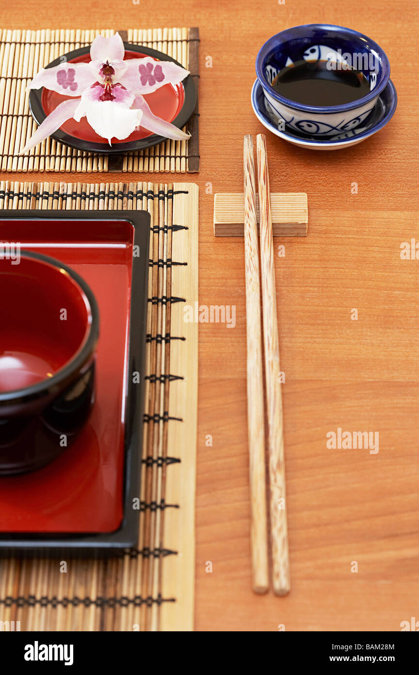 A dish and chopsticks on a table in a restaurant Stock Photo - Alamy