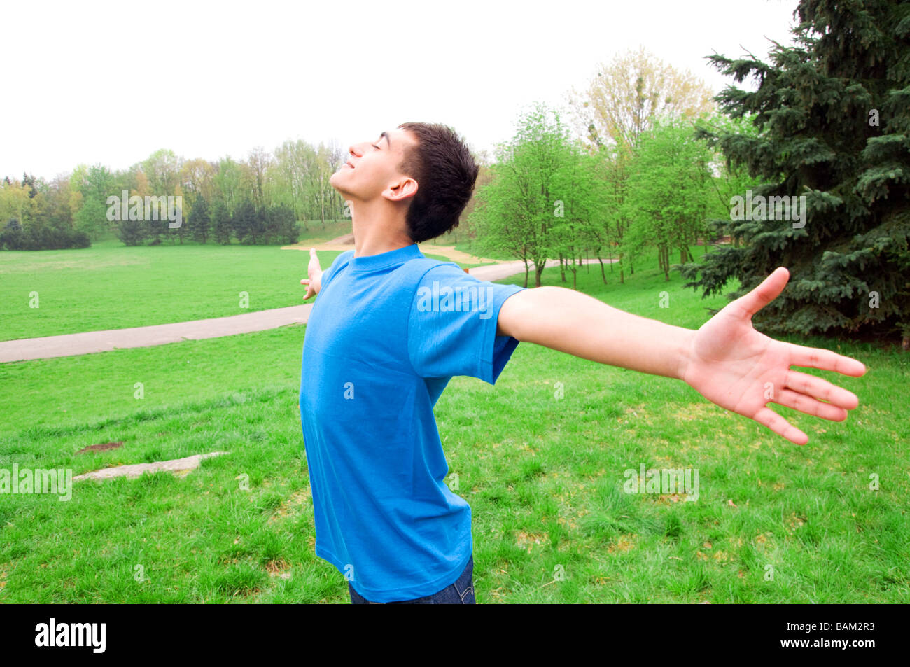 Young happy man in harmony with nature Stock Photo - Alamy