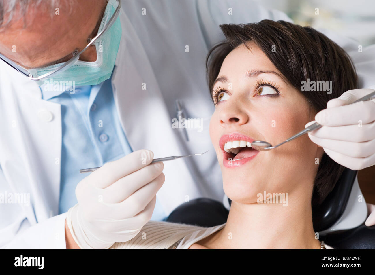 Woman having dental check up Stock Photo - Alamy