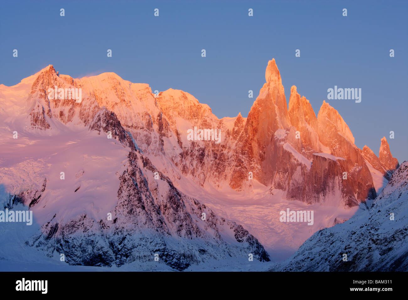 Sunrise over the Cerro Torre mountain massif in the Andes Mountain ...