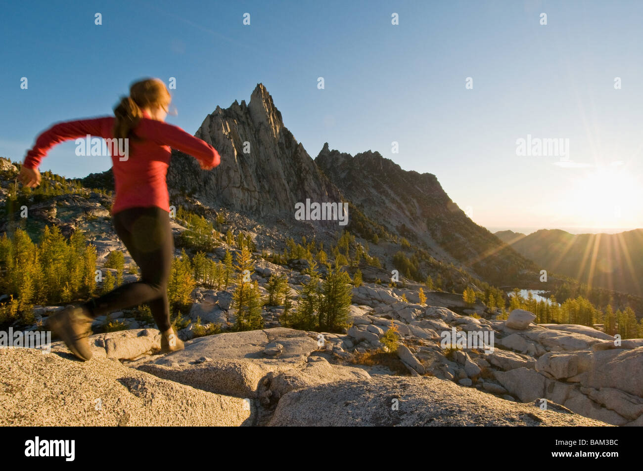 A young woman running Stock Photo - Alamy
