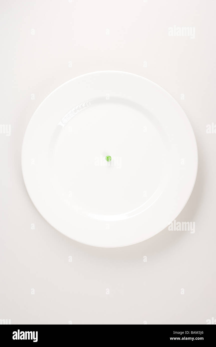 A pea on a plate Stock Photo - Alamy