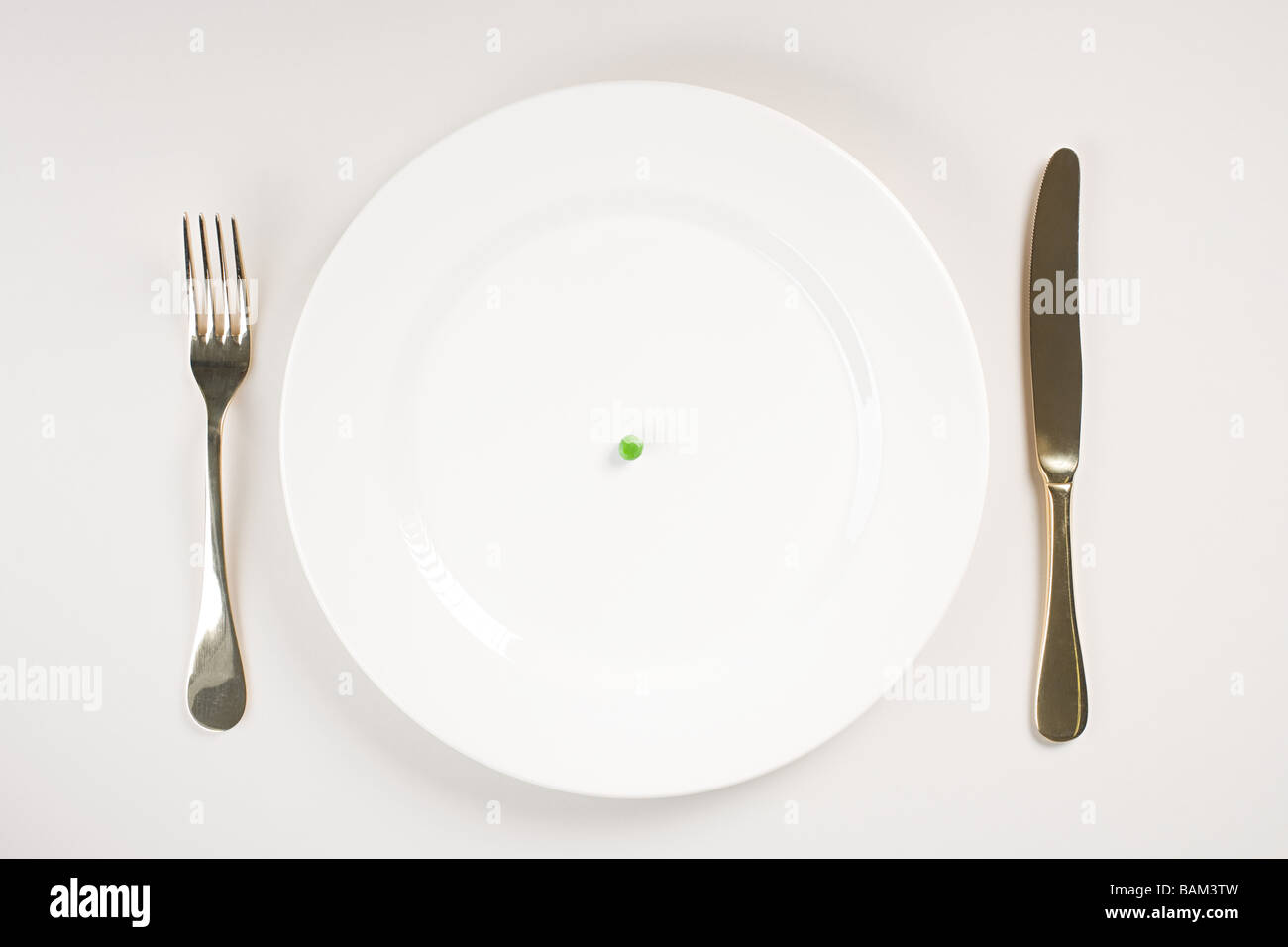 A pea on a plate Stock Photo - Alamy