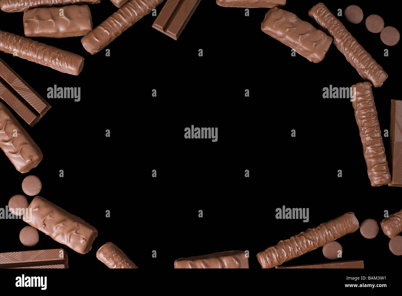 Chocolate biscuits on a black background Stock Photo - Alamy