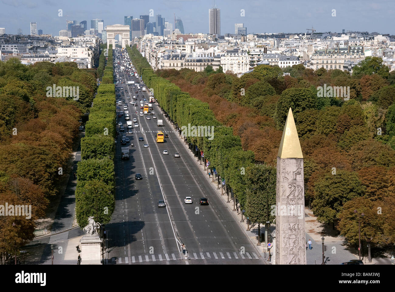 France, Paris, Champs Elysees avenue with the Arch of Triumph in the ...