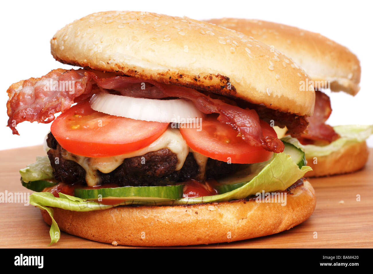 Two delicious hamburger with salads and bacon Stock Photo - Alamy