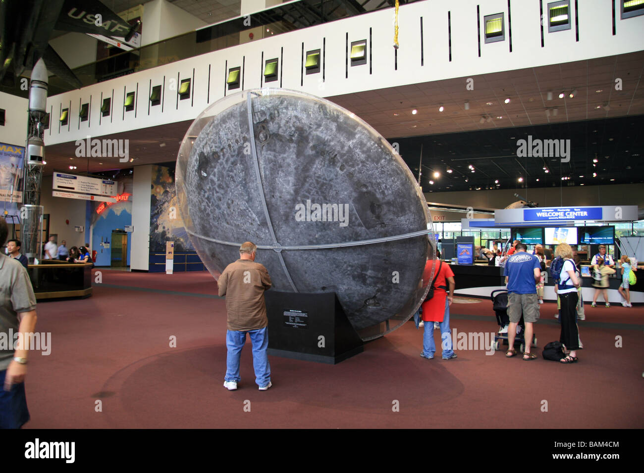 Visitors around the Apollo 11 Command Module in the main entrance to ...