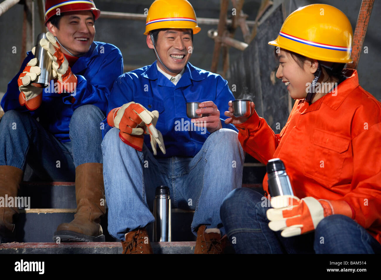 Men In Construction Site Wearing Hard Hats Stock Photo - Alamy