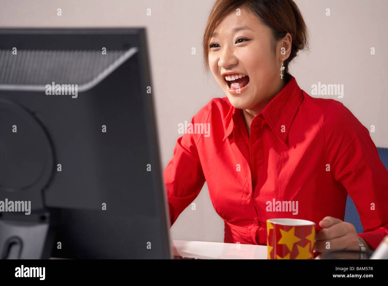 Happy chinese lady sitting hi-res stock photography and images - Alamy