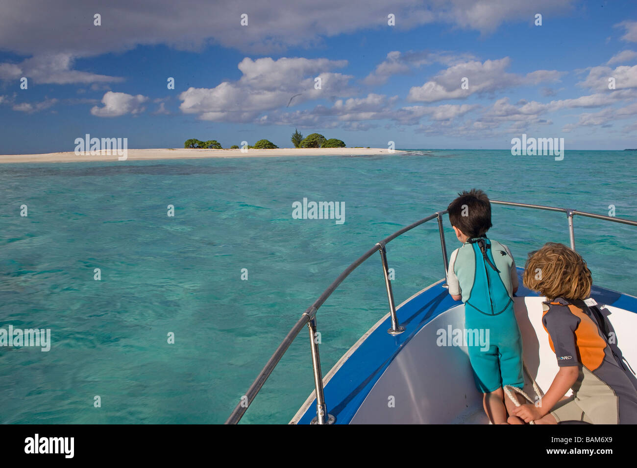 French Polynesia, Austral Islands, Tubuai island, children on a boat ...