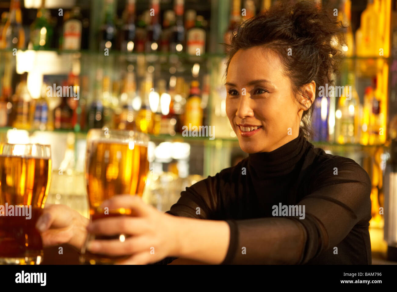 Bartender Serving Cocktail Stock Photo - Alamy