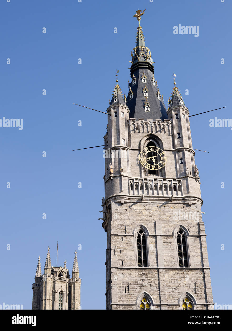 The tower of Belfort Belfry and St. Bavo Cathedral Stock Photo - Alamy