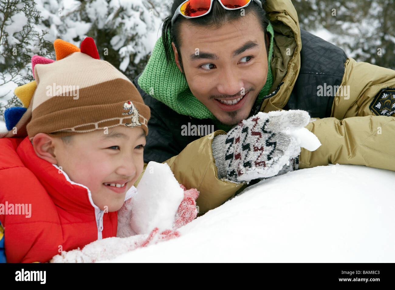 Chinese making snow man hi-res stock photography and images - Alamy