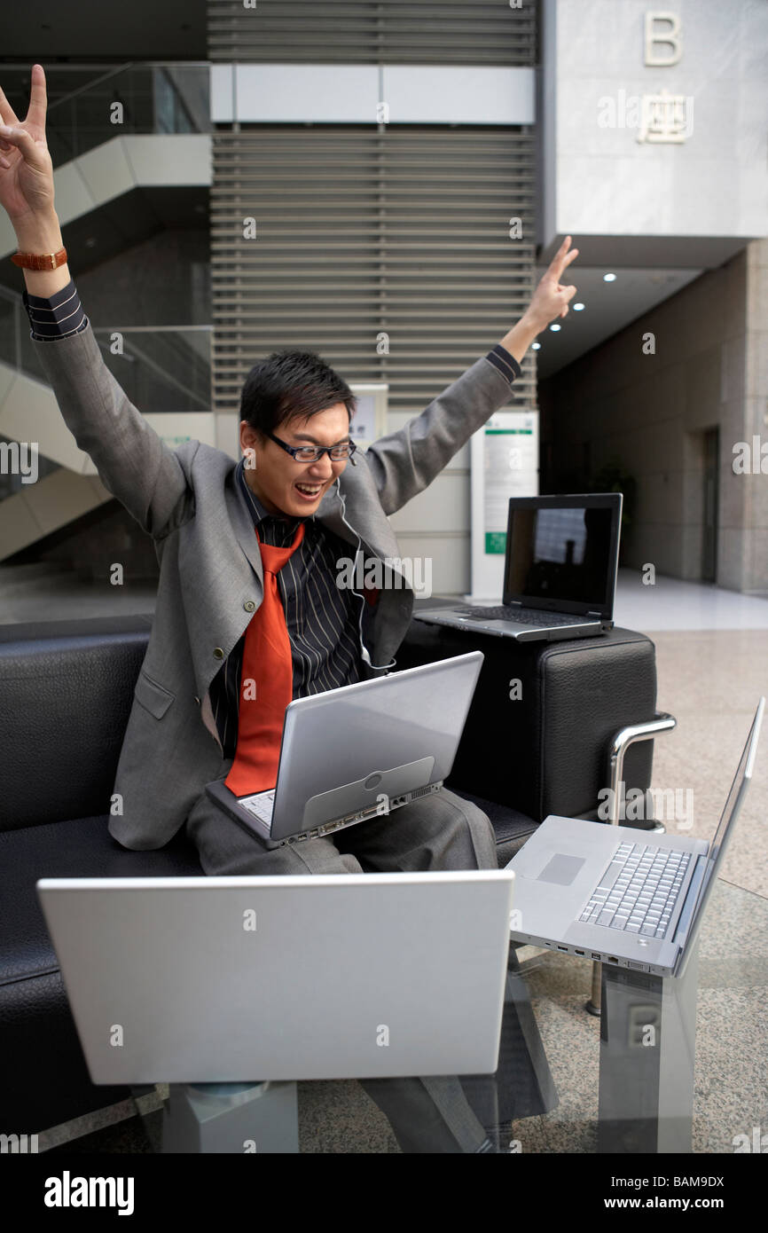 Three businessmen cheering hi-res stock photography and images - Alamy