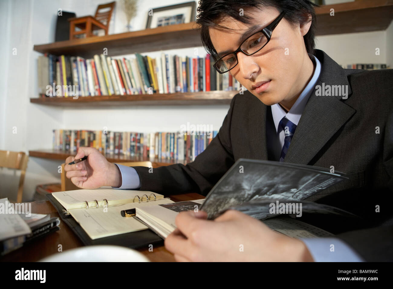 Seated gentleman writing hi-res stock photography and images - Alamy