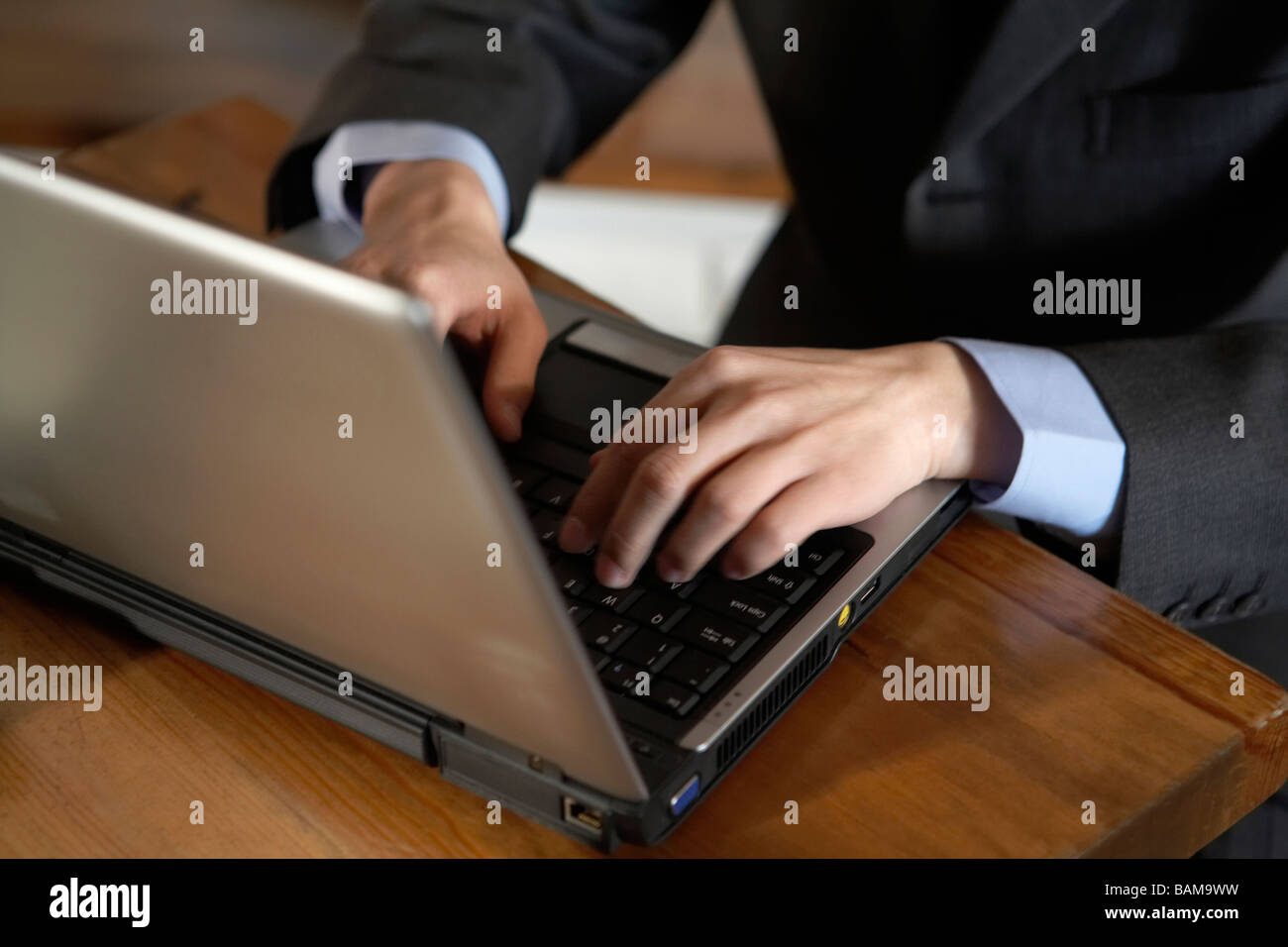 Man Typing On Laptop Computer Stock Photo - Alamy