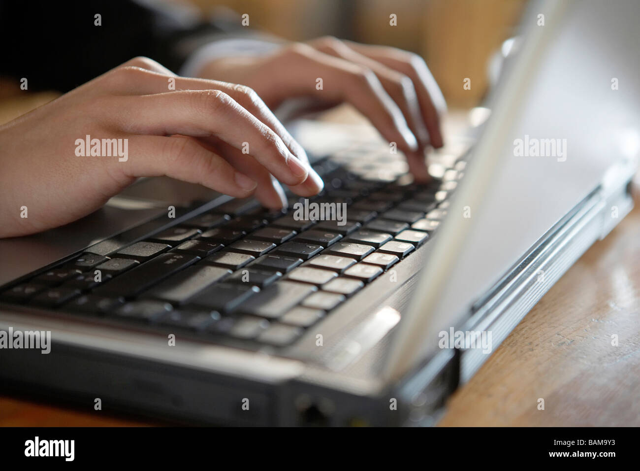 Man Typing On Laptop Computer Stock Photo - Alamy