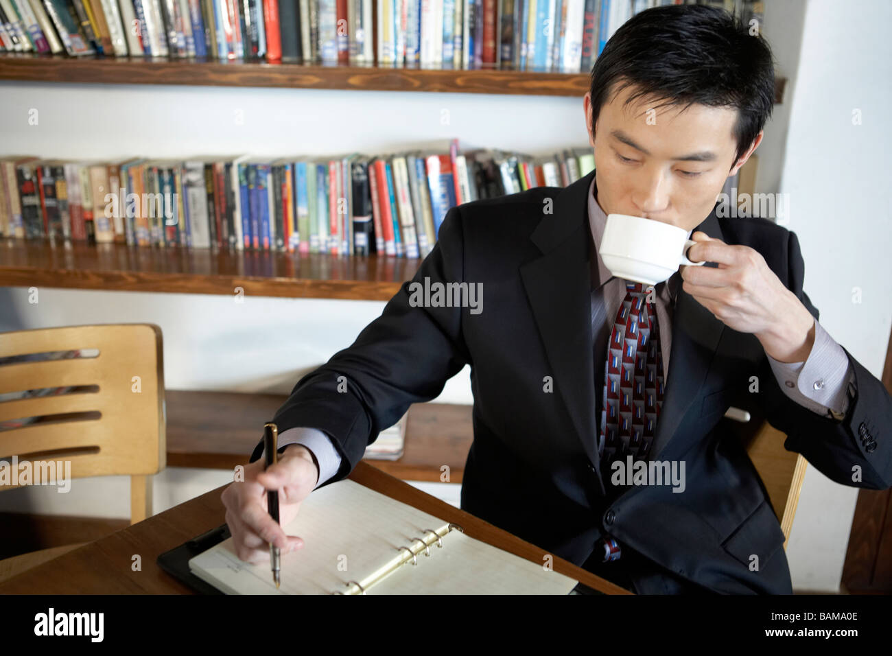 Seated gentleman writing hi-res stock photography and images - Alamy