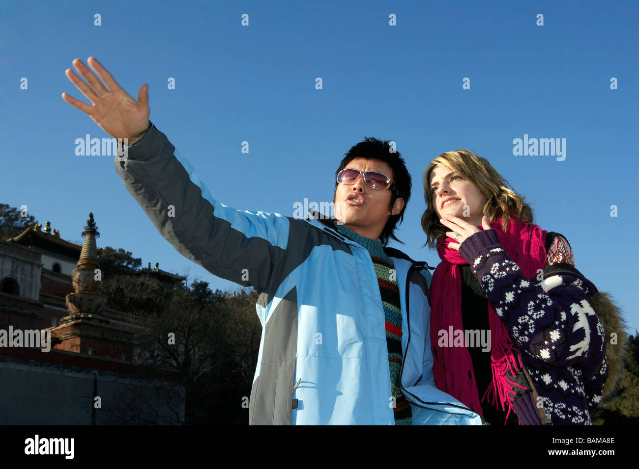 Young Man Explaining The Sights To Woman Stock Photo - Alamy