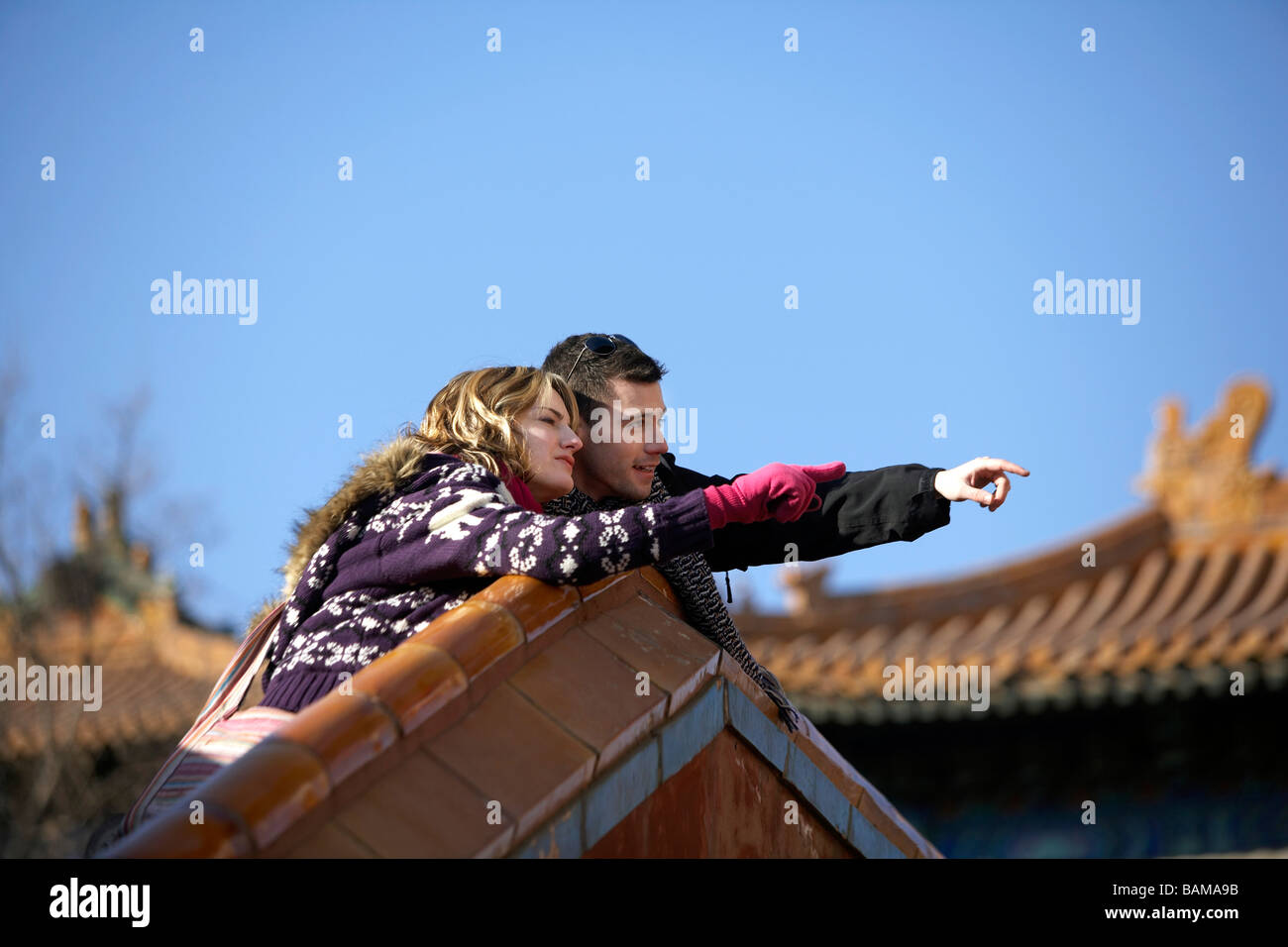 Man And Woman Pointing Into The Distance Stock Photo - Alamy