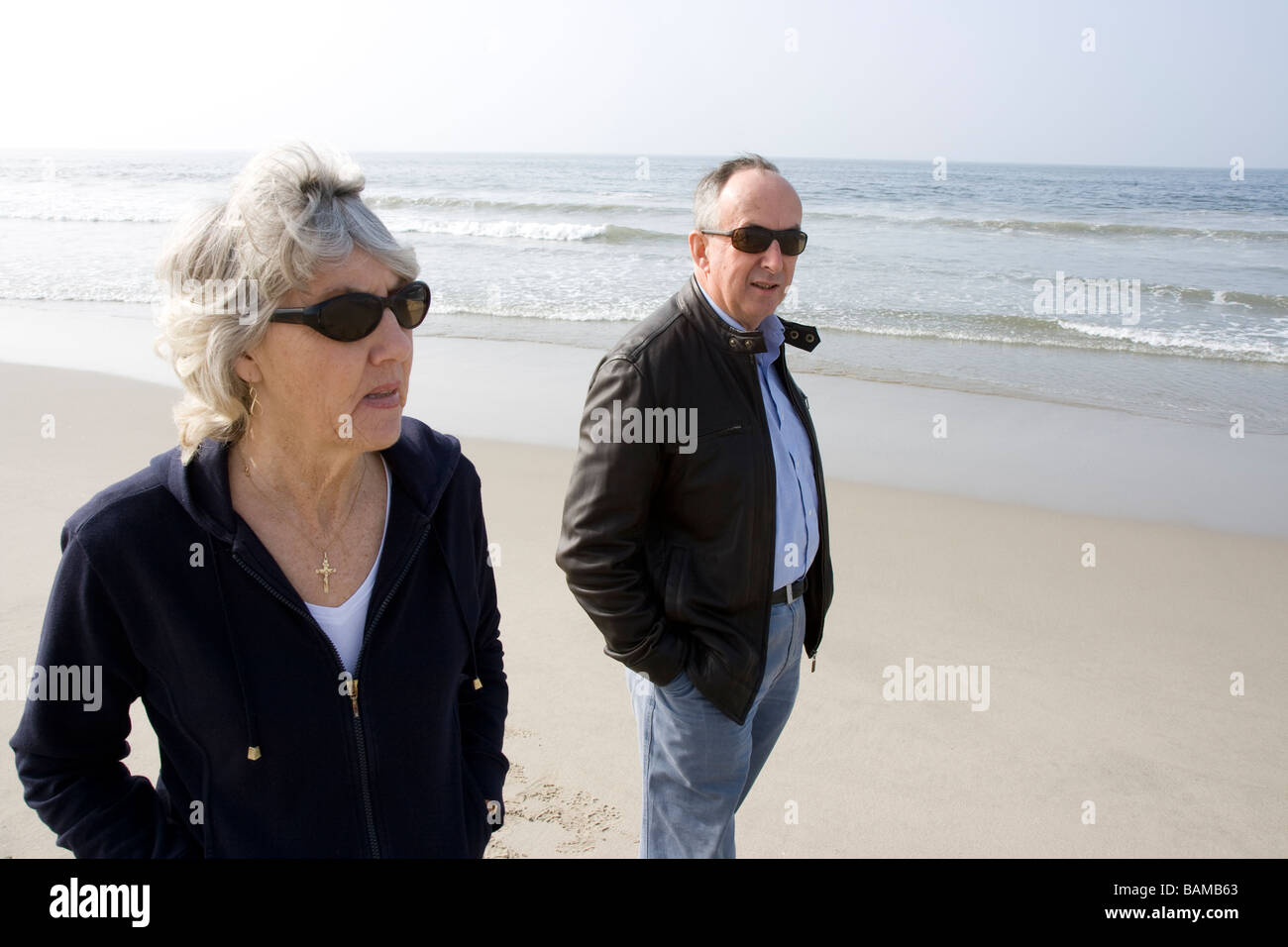 Retired Couple on Beach Stock Photo - Alamy