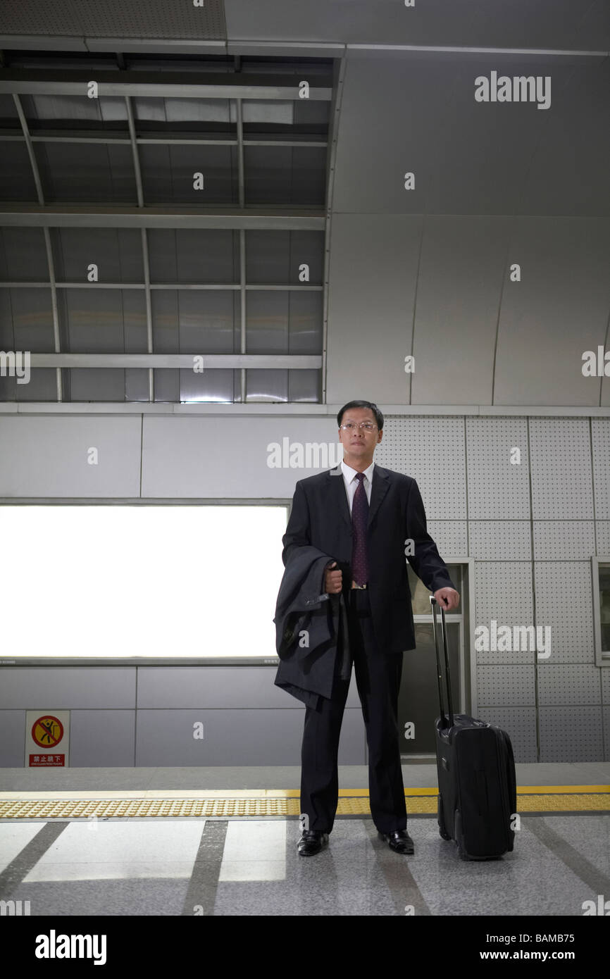 Businessman Standing On Platform Stock Photo - Alamy