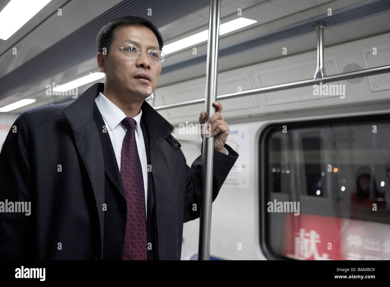 Man Standing On Train Stock Photo - Alamy