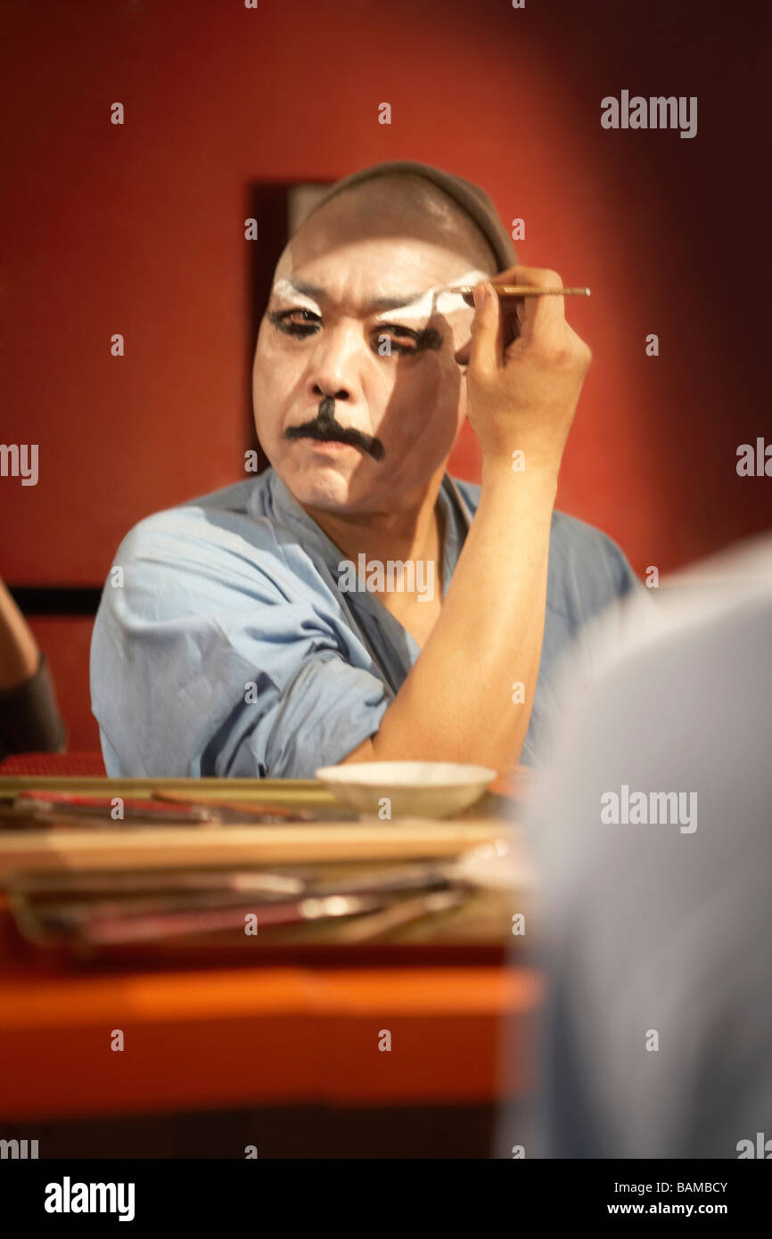 Chinese beijing opera performer applying hi-res stock photography and ...