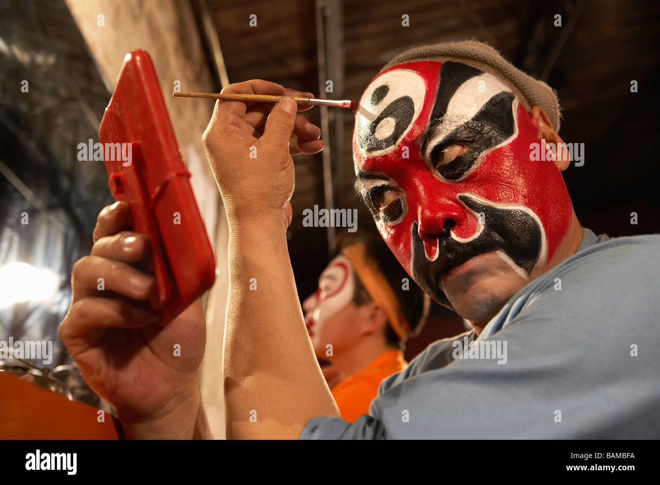 Man Applying Traditional Face Paint Stock Photo - Alamy