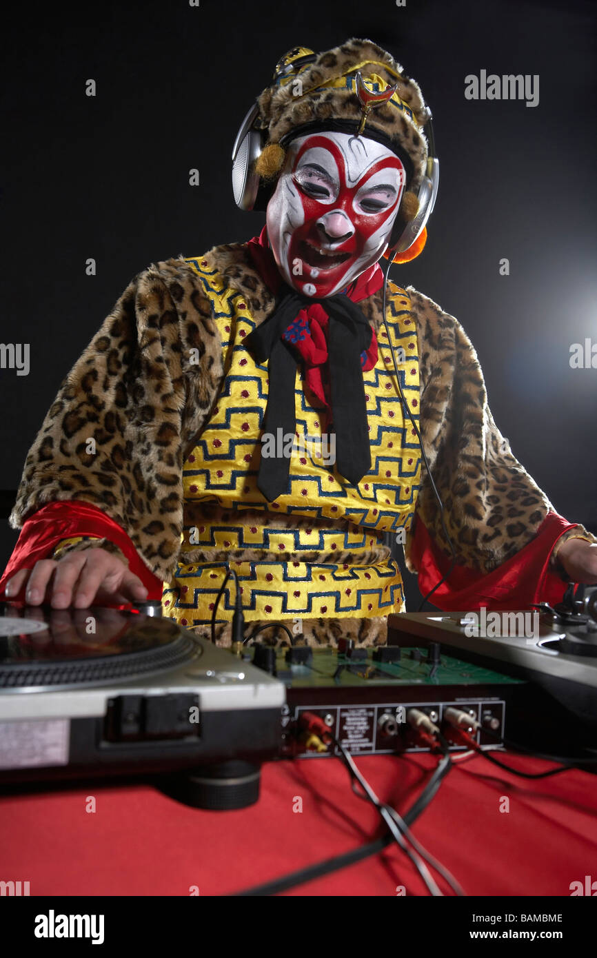 Man In Ceremonial Costume Using Turn-Tables Stock Photo - Alamy