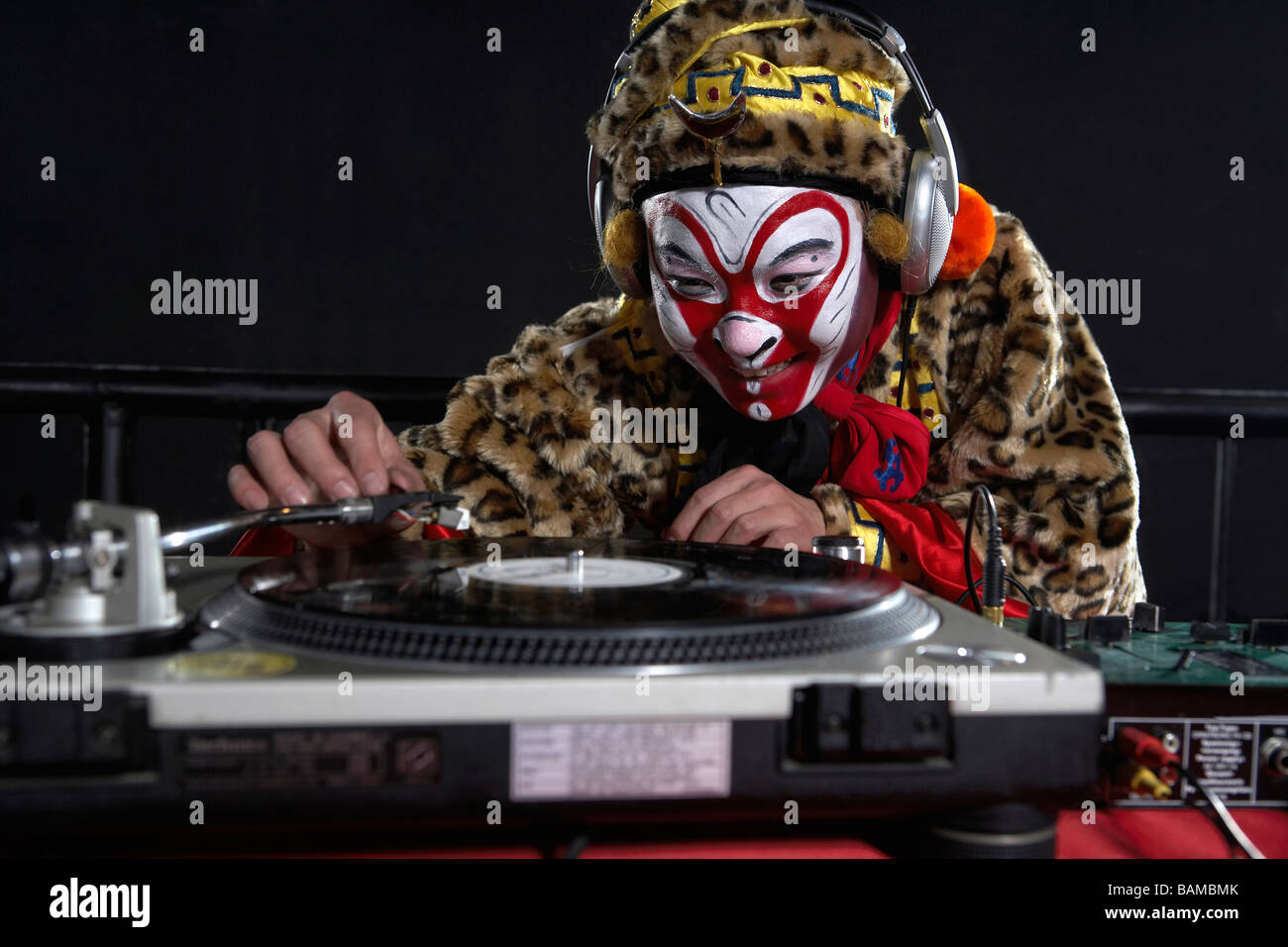 Man In Ceremonial Costume Using Turn-Tables Stock Photo - Alamy